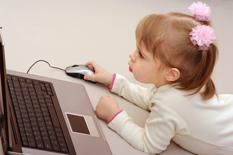 Child is studying computer stock image. Image of families - 12454909