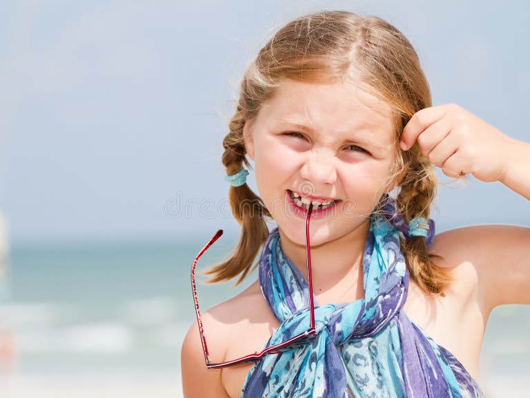 Child with Sunglasses at the Beach Stock Photo - Image of blue, space ...