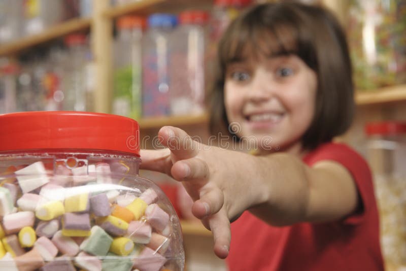 Child in sweet shop stock photo. Image of happy, candy - 8639098