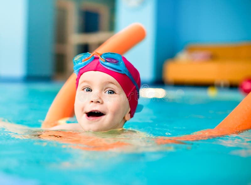Child in a swimming pool stock photo. Image of happy - 14168802