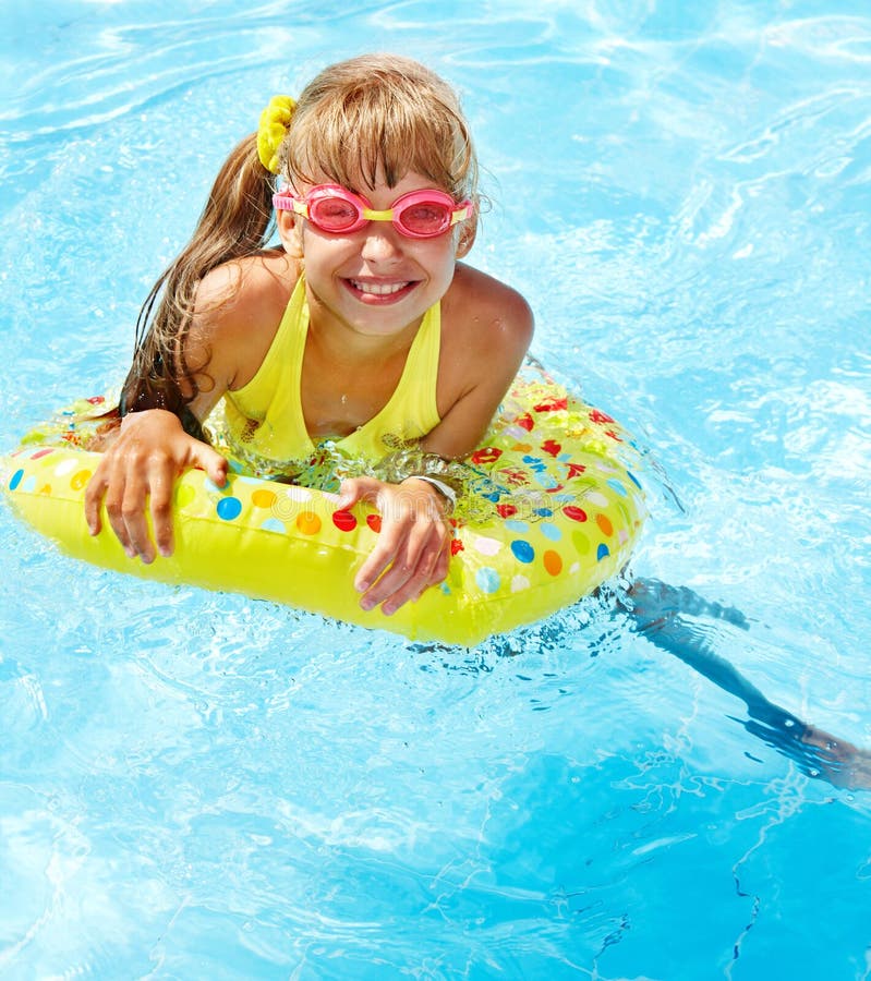 Child in swimming pool stock image. Image of armbands - 24154031