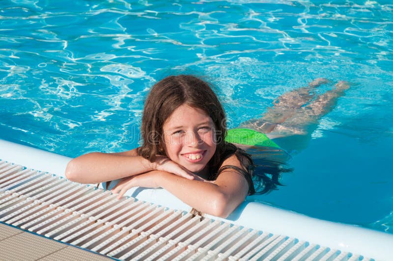Child at swimming pool stock photo. Image of girl, splash - 76733858