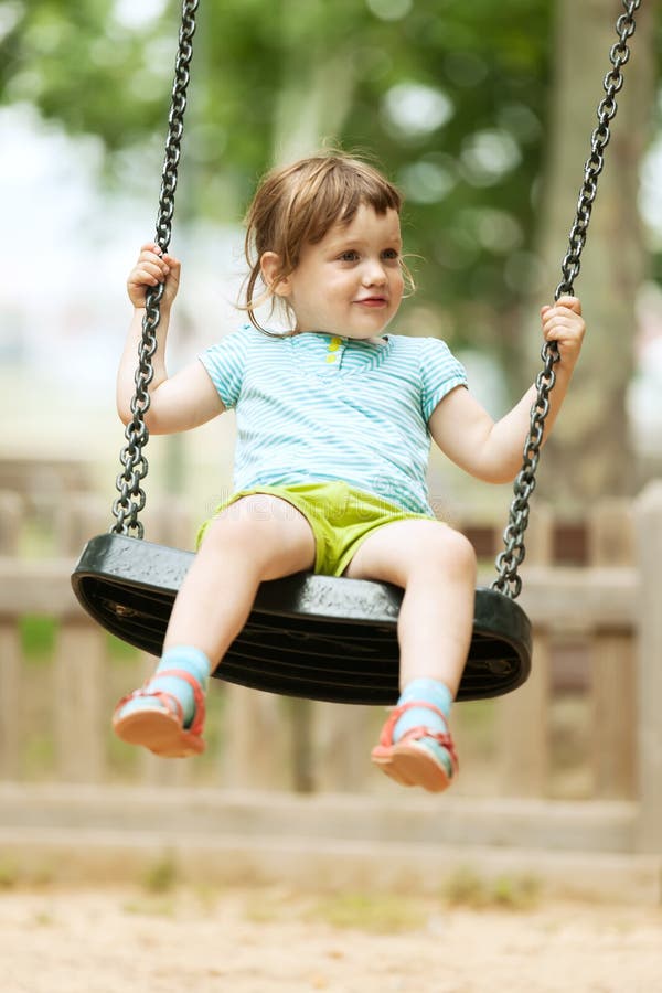 Child on swing stock photo. Image of game, house, outside - 34892344
