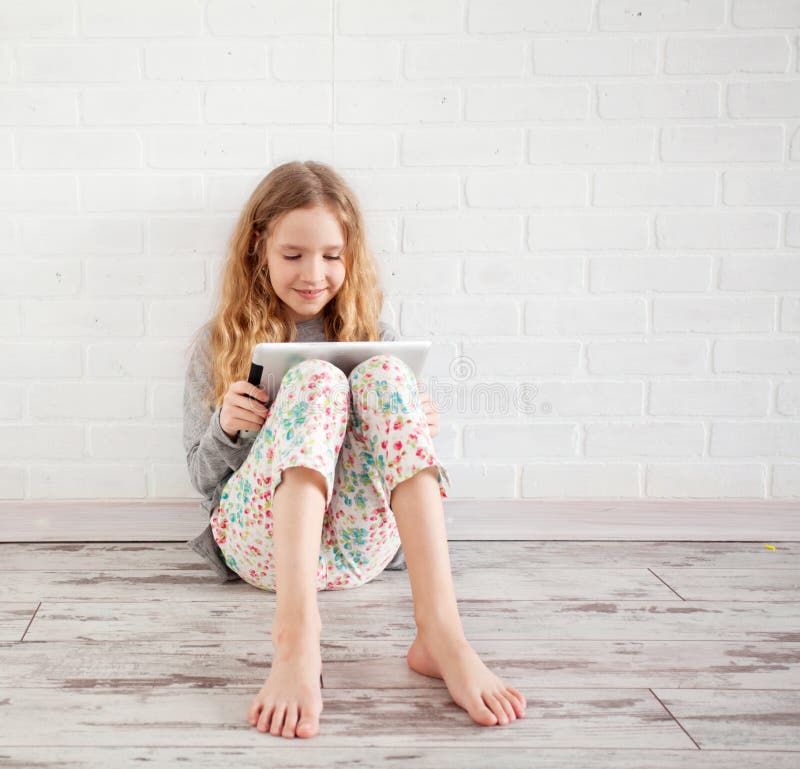 Child with tablet stock image. Image of casual, person - 155106089