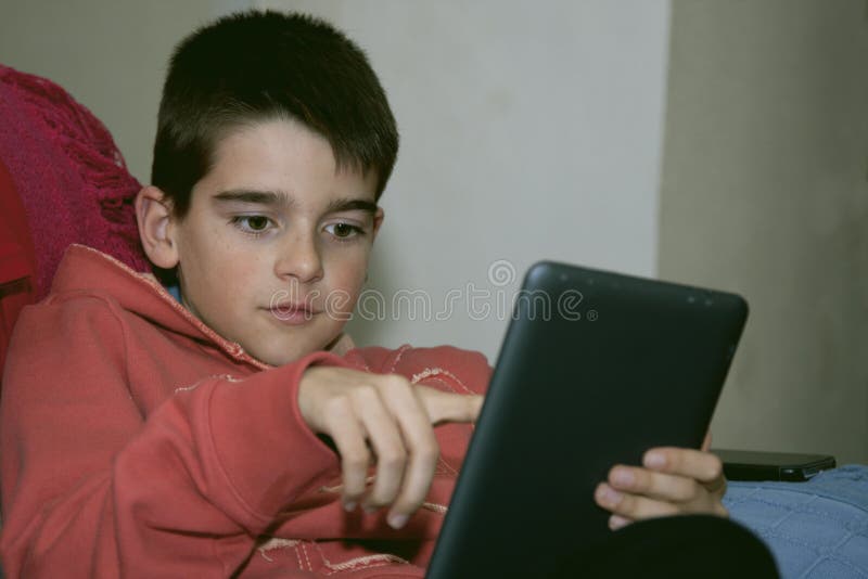 Child with tablet stock photo. Image of home, laptop - 52809336