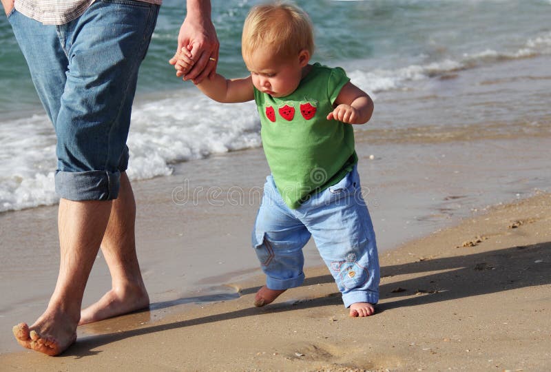 Child Taking Her First Steps Stock Image - Image of hiking, adult: 24555243