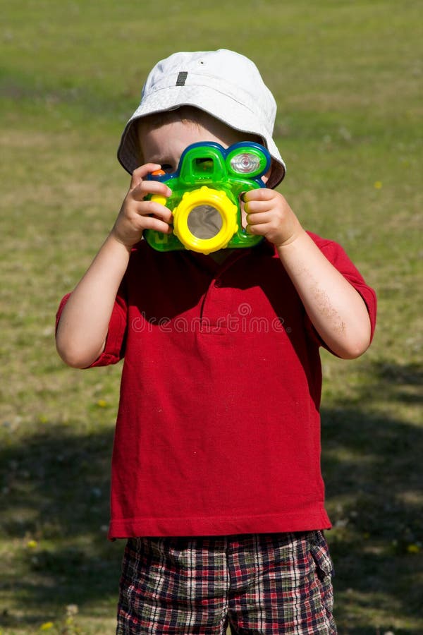 Child taking photos stock photo. Image of camera, toys - 9791004