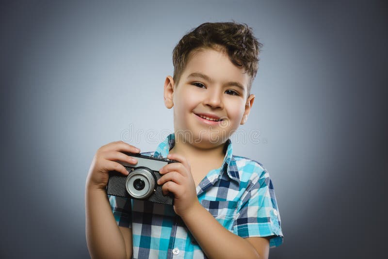 Child Taking a Picture Using a Retro Rangefinder Camera Isolated Grey ...