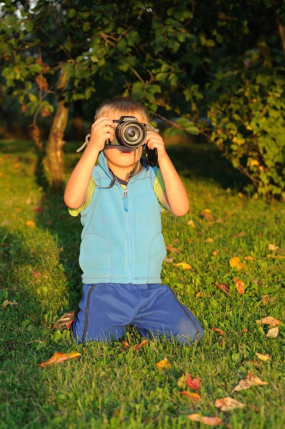 Child taking pictures stock image. Image of portrait - 26777657
