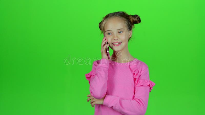 Child is Talking on the Phone with Her Mom. Green Screen Stock Video ...