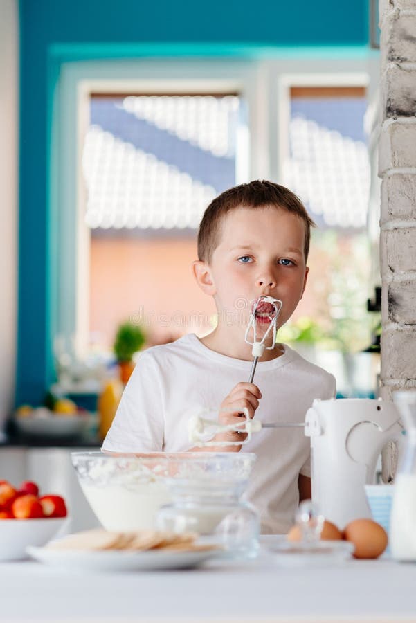 Child Tasting Pastry from Mixer Agitator Stock Photo - Image of bowl ...