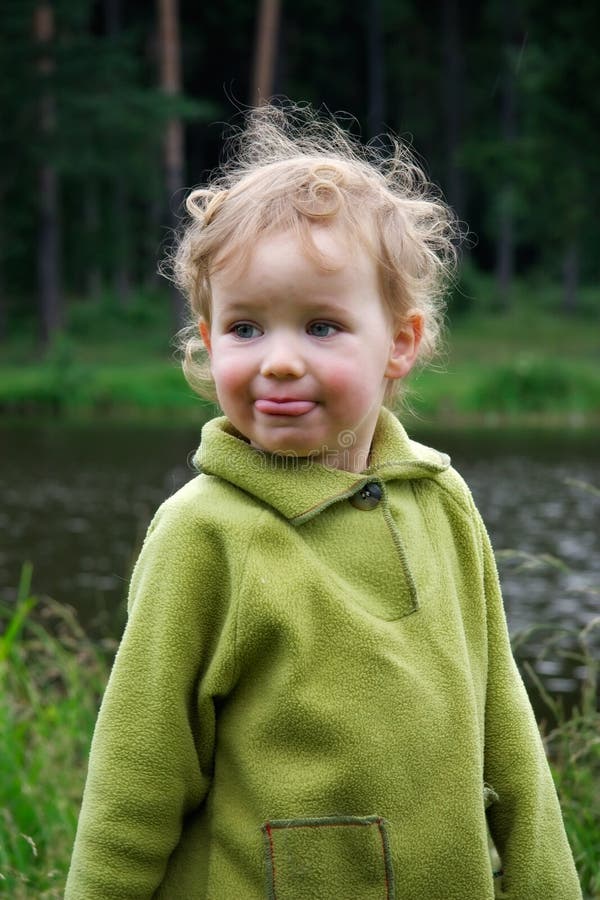 The child is teased stock photo. Image of silence, green - 314904