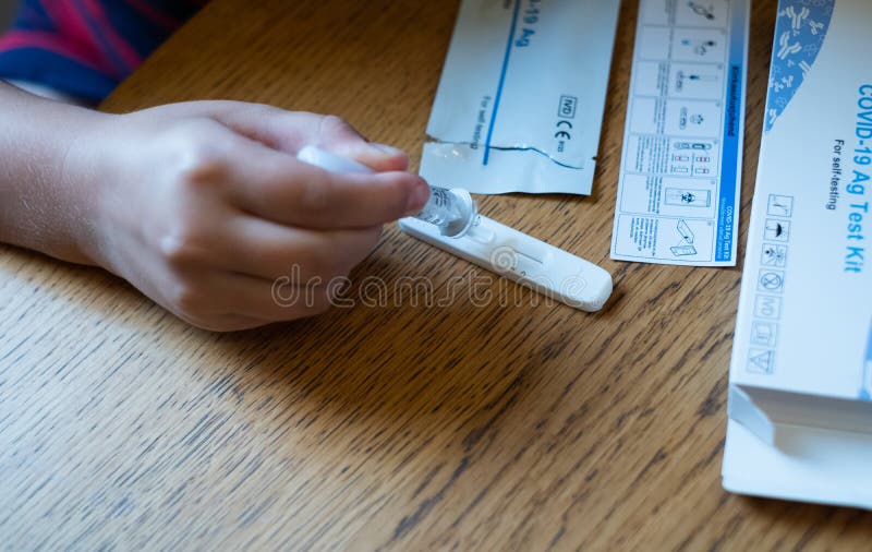 Child Testing Herself for Coronavirus at Home Stock Photo - Image of ...