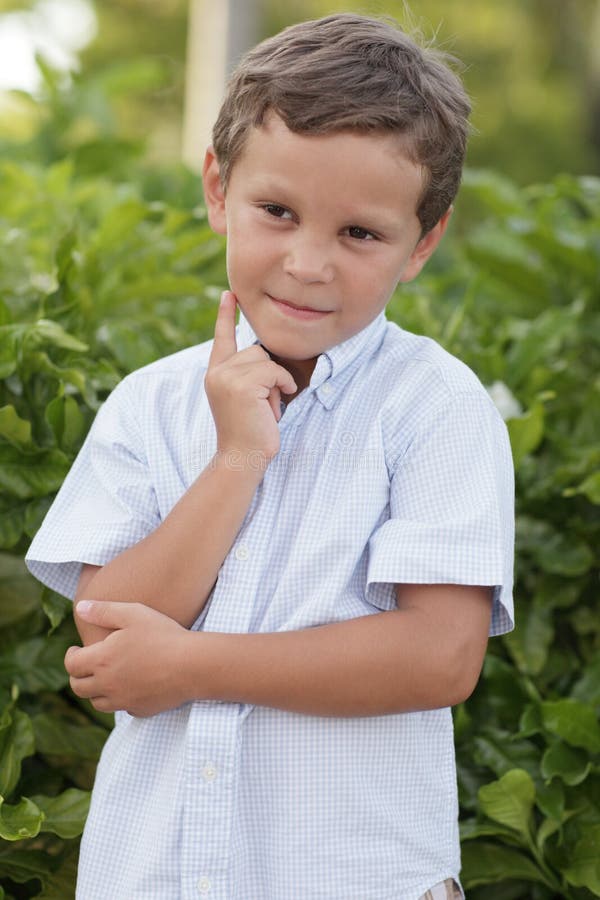 Child thinking stock image. Image of park, child, outdoors - 16659669