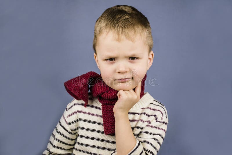 Child thinking stock photo. Image of annoyed, rukalitso - 65820092