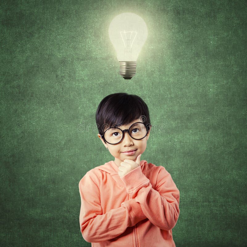 Child in Thinking Poses while Looking at Lamp Stock Photo - Image of ...