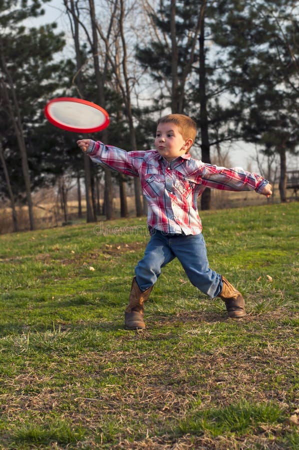 Playing frisbee stock image. Image of farm, outside, throwing - 39643475