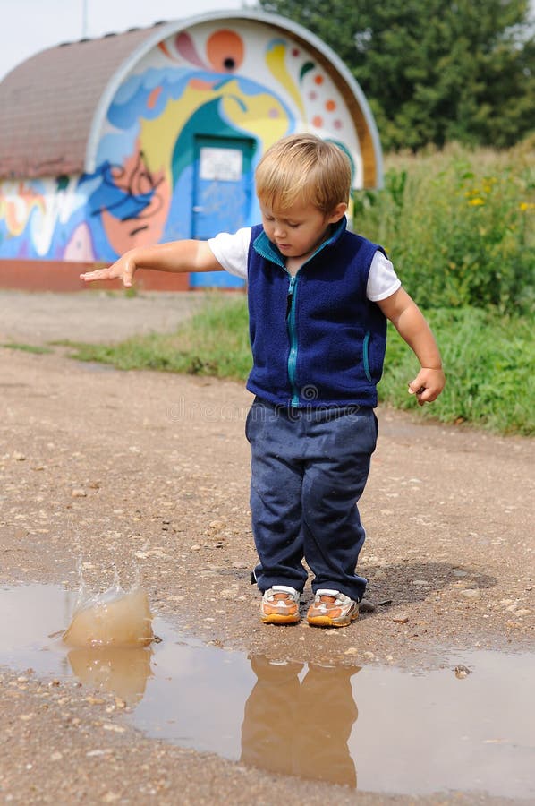 Child Throwing Small Stone To Pool Stock Image - Image of pleasure ...
