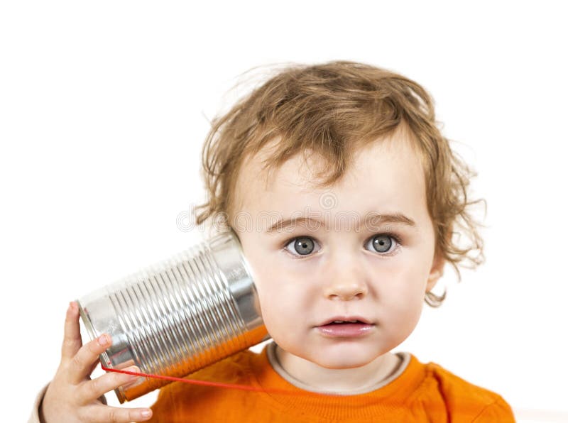 Child with Tin Can Phone Looking To Camera Stock Photo - Image of ...