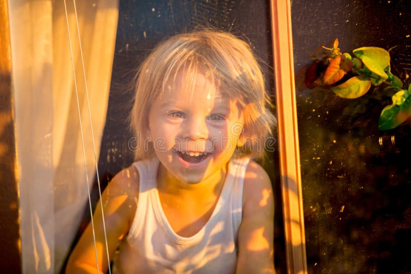 Child, Toddler Boy, Looking through Window Stock Image - Image of home ...