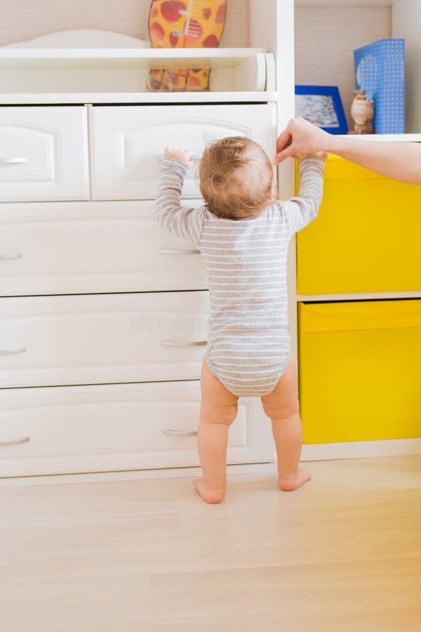 Child and Toddler Concept - Curious Baby in the Room Stock Photo ...