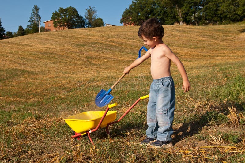 Child with Tools and Wheelbarrow Stock Image - Image of adorable, game ...
