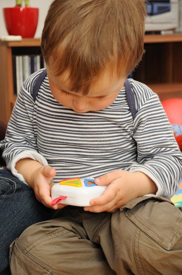 Child with toy stock photo. Image of enjoy, child, cute - 18995692