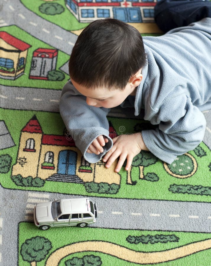 Child with toy car stock photo. Image of active, caucasian - 23912552