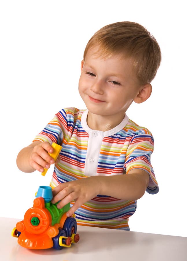 The child with toy machine stock image. Image of satisfaction - 3051065