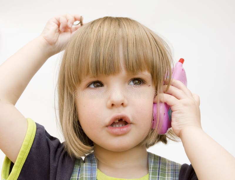 Child with a toy telephone stock image. Image of telephone - 5034197