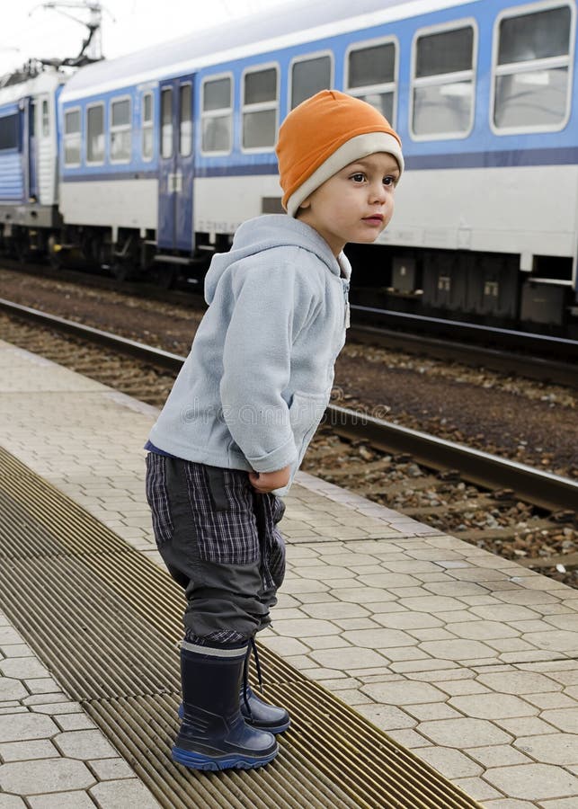 Child at train station stock image. Image of person, youth - 34821615