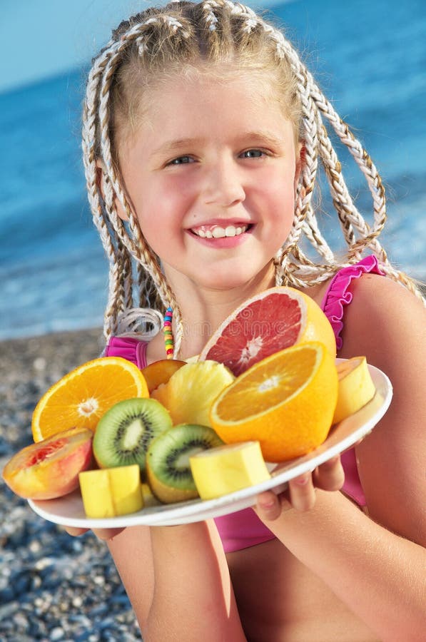 Child with tropical fruit stock photo. Image of kiwi - 26114704