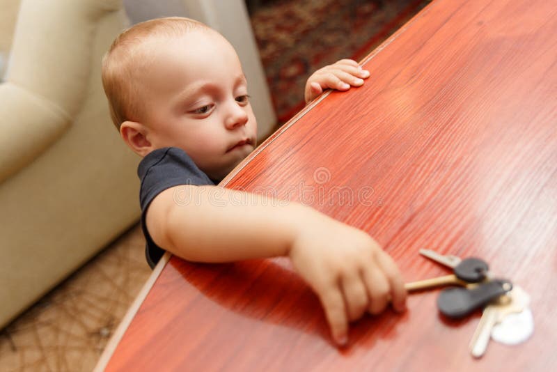 Child is Trying To Steal the Keys Stock Photo - Image of head, person ...