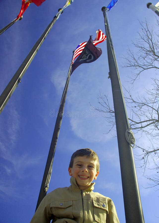 Child Under Flags stock image. Image of flags, expression - 104893