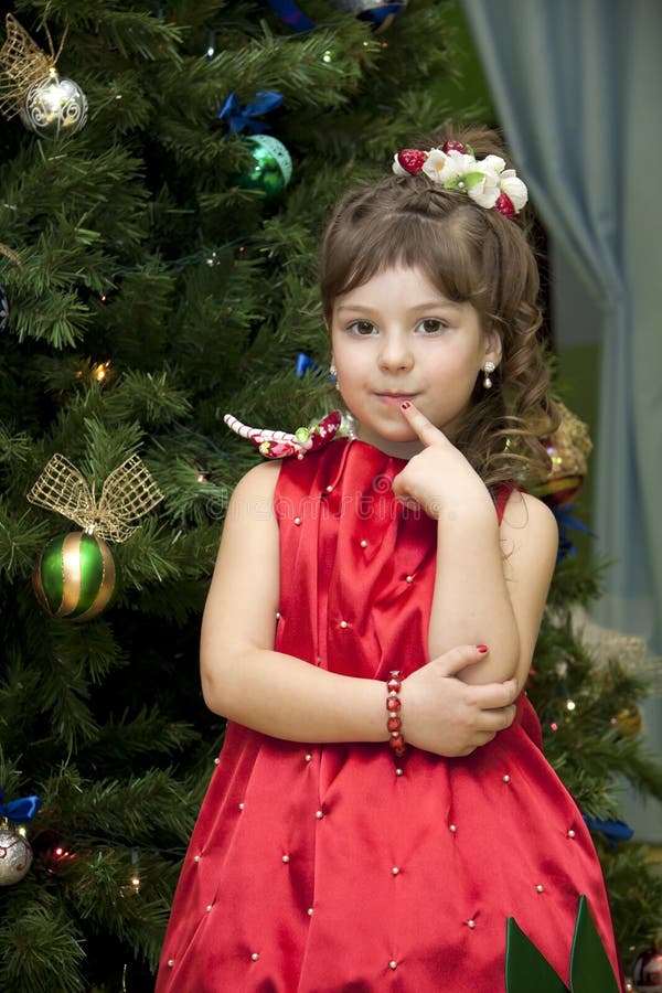 Child under a fur-tree stock image. Image of bracelet - 26765611