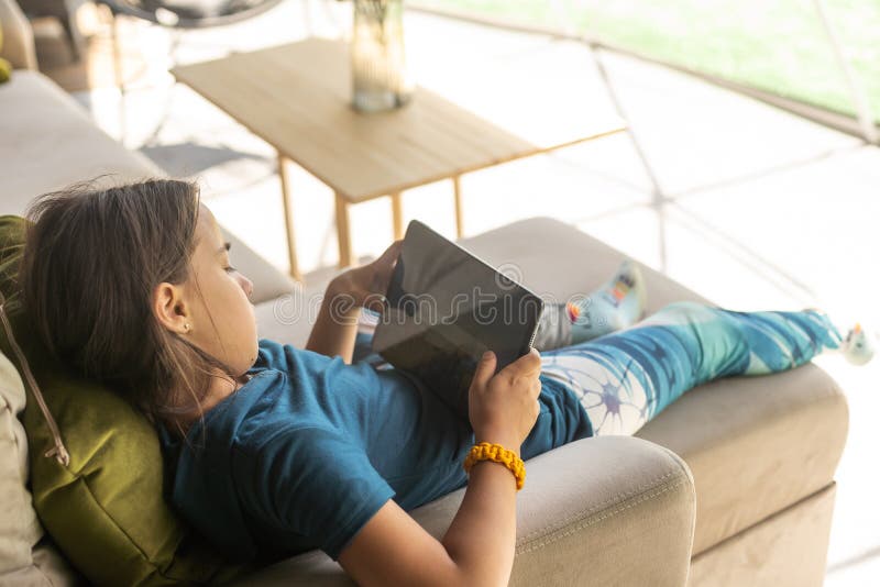 Child uses a Tablet PC stock photo. Image of education - 263657408