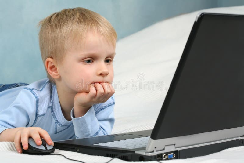 Child using a computer stock image. Image of stares, keyboard - 1981523