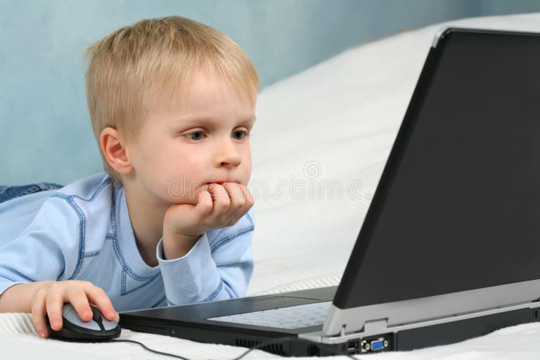 Child using a computer stock image. Image of stares, keyboard - 1981523
