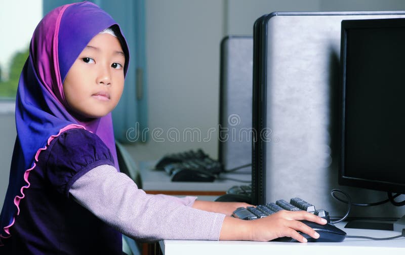 Child Using computer stock image. Image of elementary - 49780569