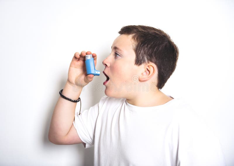 Child Using Inhaler for Asthma Over White Background Studio Stock Image ...