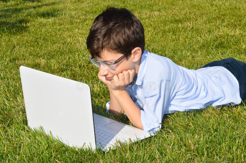 Child using laptop stock photo. Image of outdoor, connect - 66913154