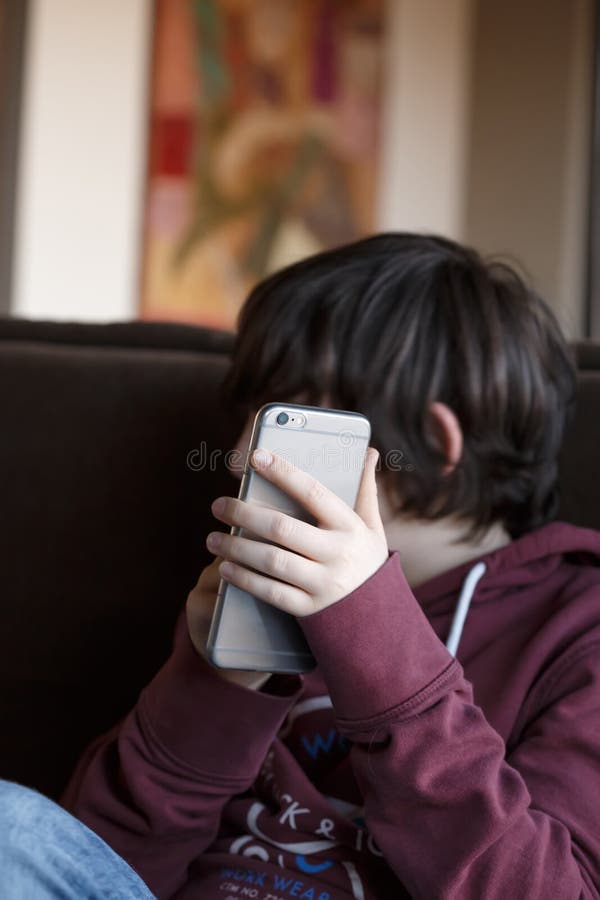Child using a mobile phone stock image. Image of screen - 65812217