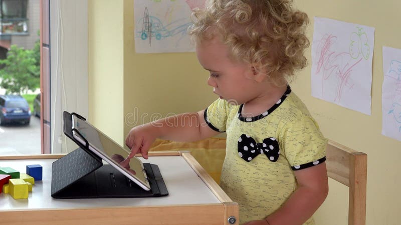 Child Using Tablet Computer for Education in Preschool. Stock Footage ...