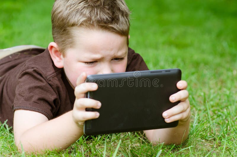 Child Using Tablet Computer Stock Image - Image of face, people: 32607137