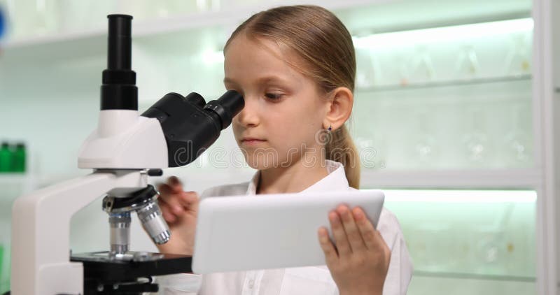 Kid Using Microscope in Chemistry Laboratory, Child with Tablet ...