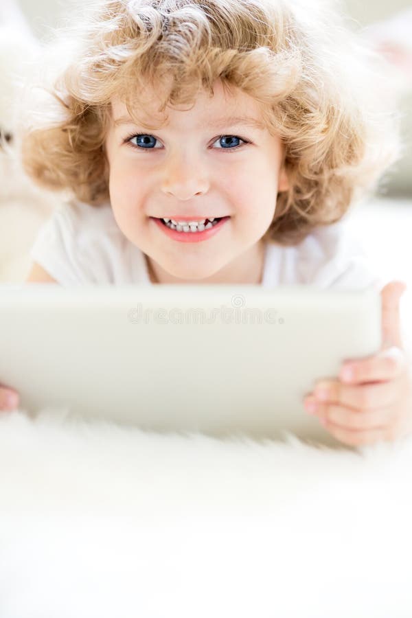 Child using tablet pc stock image. Image of copy, learning - 25381737