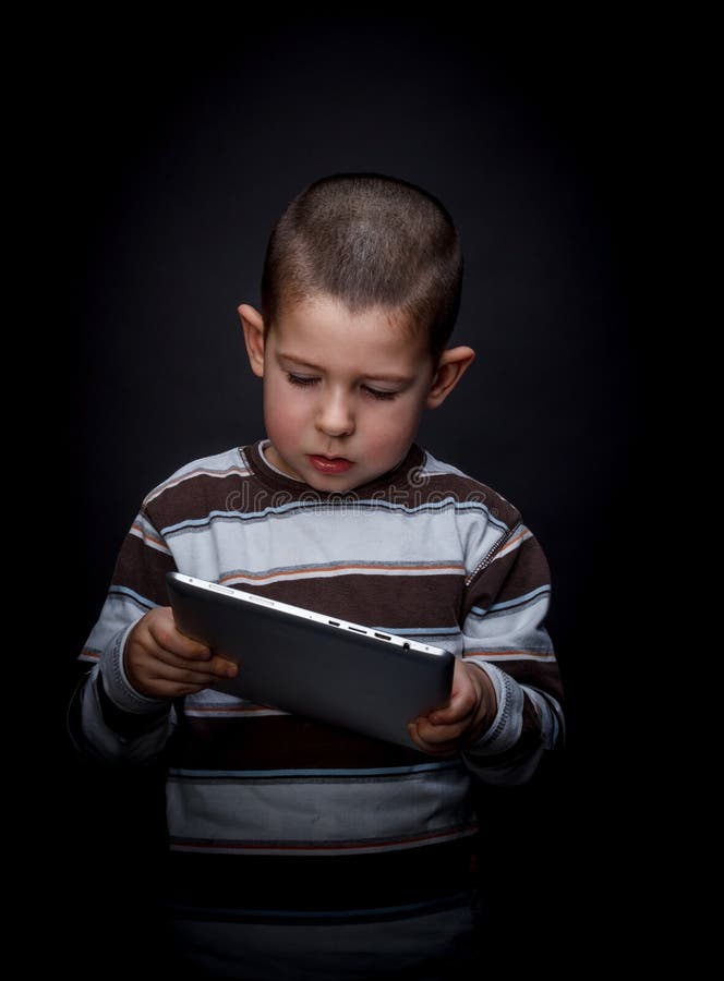 Child with Tablet PC stock image. Image of friends, surf - 50097771