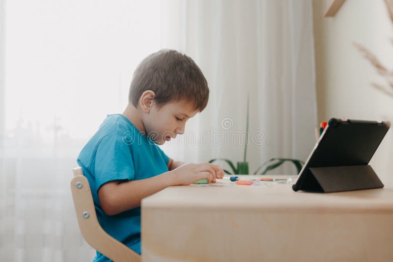 Child Using Gadgets for Study. Education and Distance Learning Concept ...