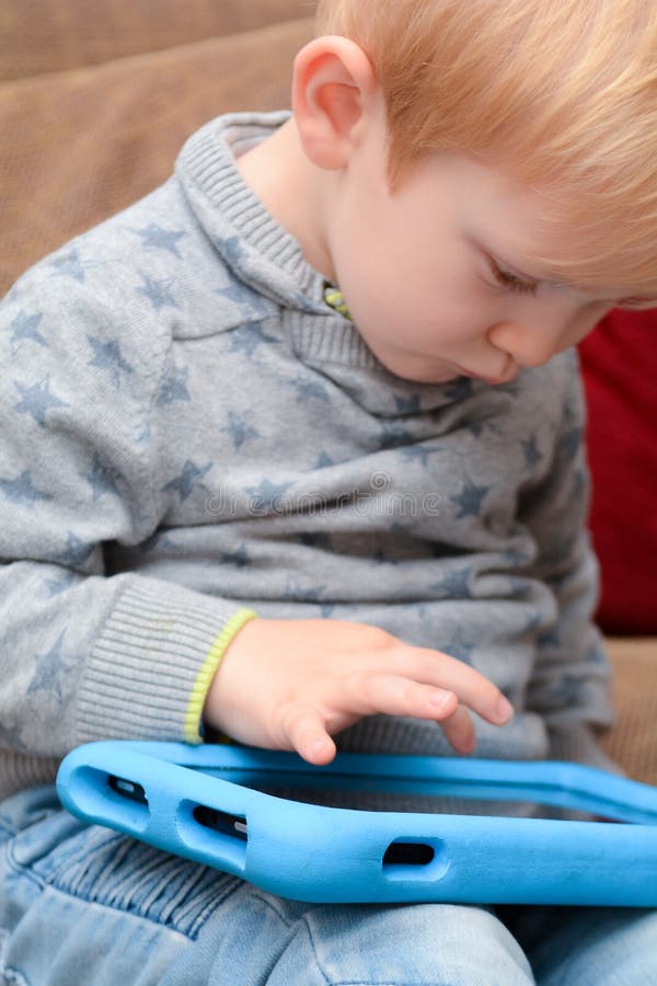 Child Using a Tablet Touch Screen Device Stock Photo - Image of tablet ...