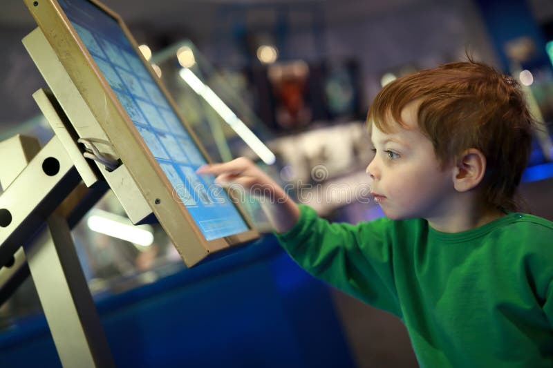 Child using touch screen stock photo. Image of cute - 113175796